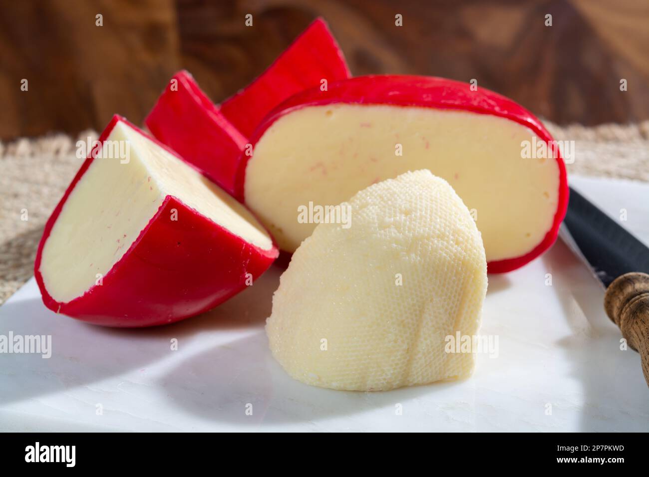 British red waxed original cheddar cheese madse from cow milk close up ...