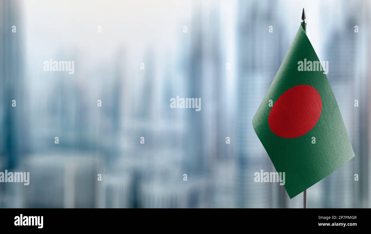 Small flags of the Bangladesh on an abstract blurry background Stock ...
