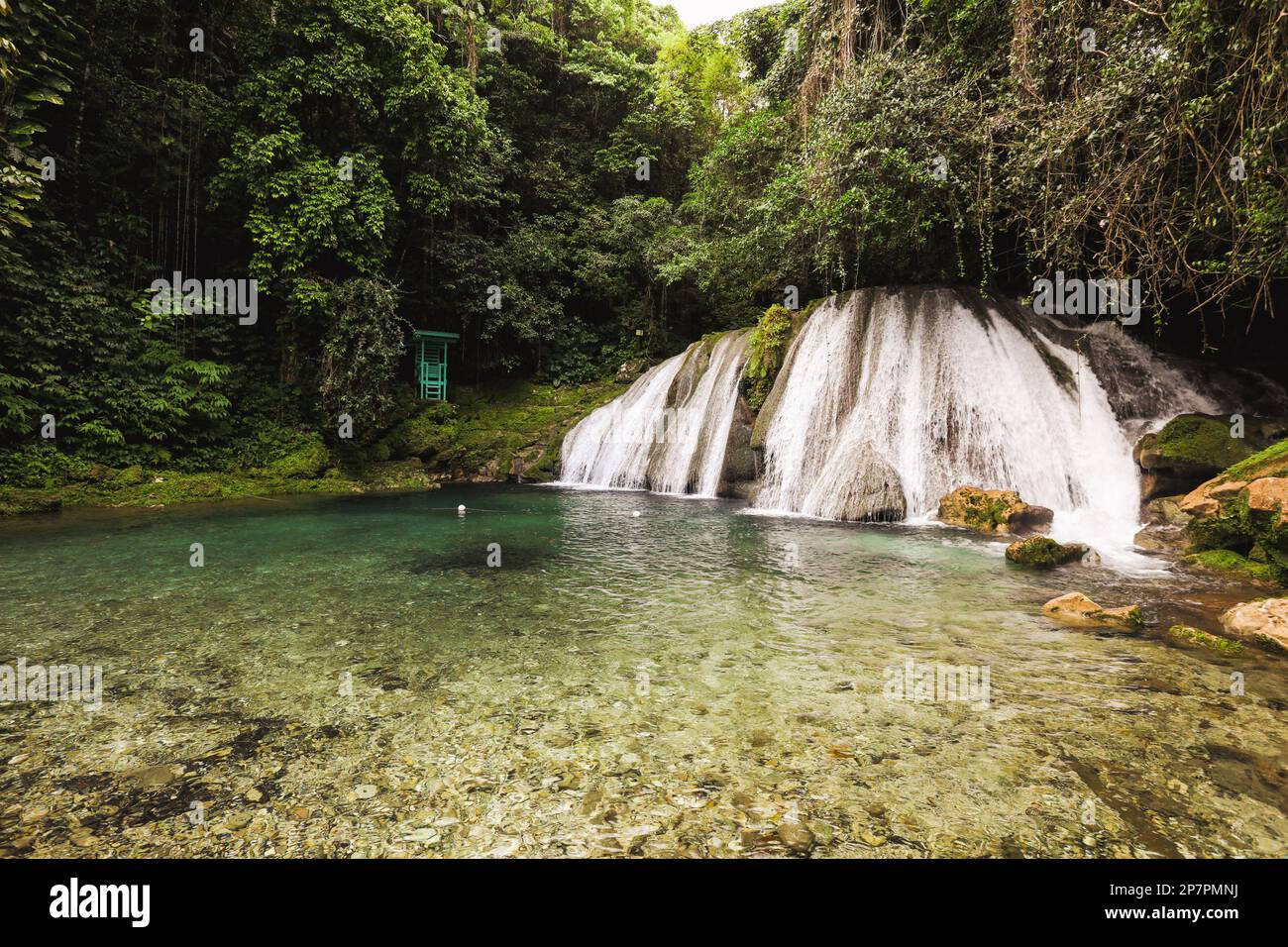 The scenic, lush waterfall and tropical backdrop of Reach Falls in ...