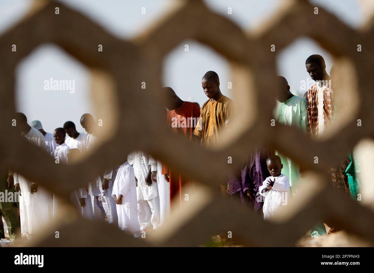 Senegalese Muslims from the Layenne religious brotherhood participate ...