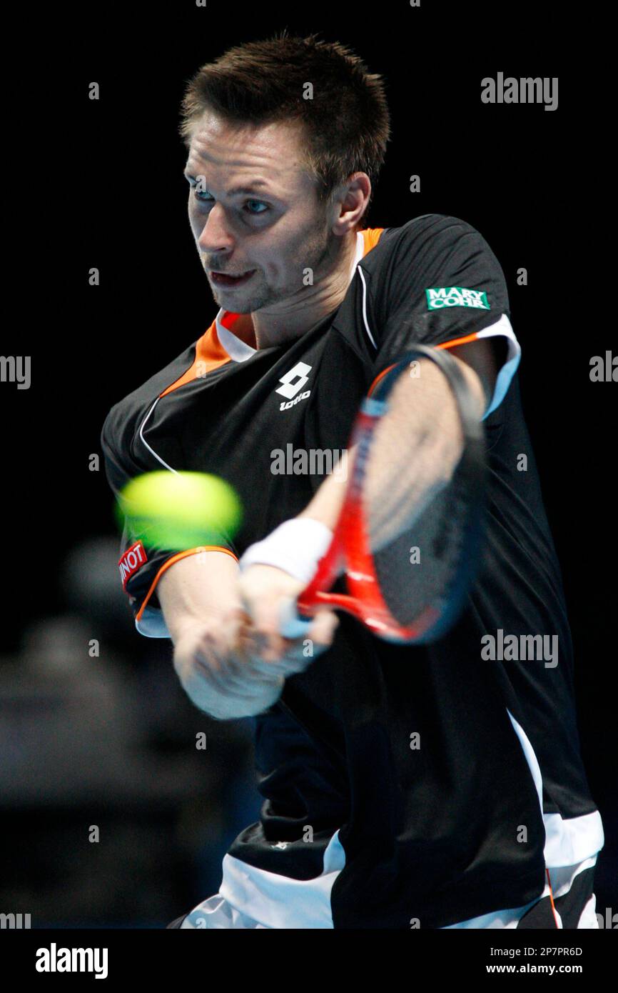 Sweden's Robin Soderling returns the ball to Russia's Nikolay Davydenko ...