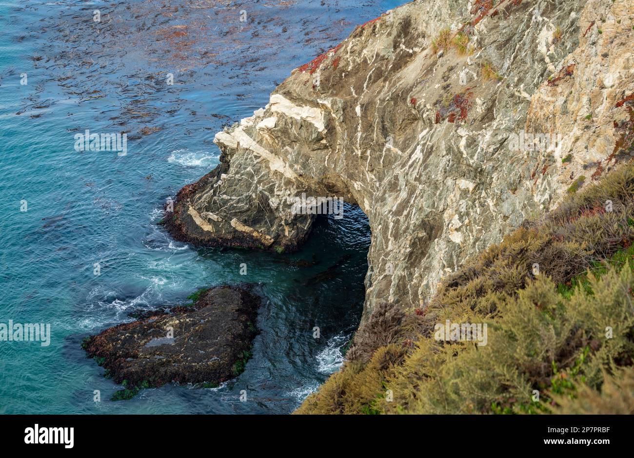 Rock Arch in the Pacific Ocean at Big Sur Stock Photo - Alamy