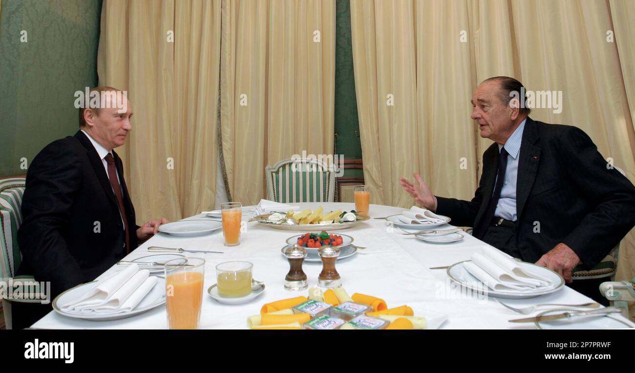 Russian Prime Minister Vladimir Putin, left, and former French ...