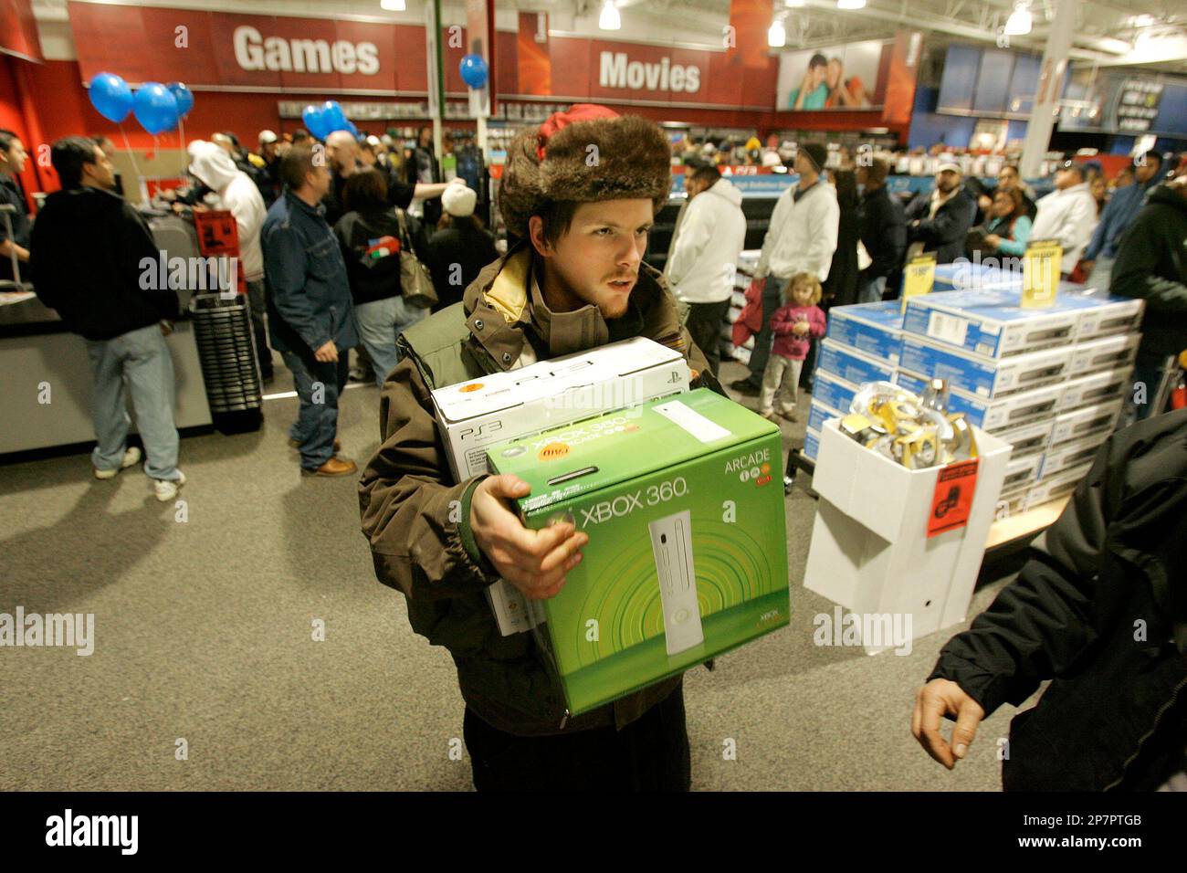 Jon Bellamy, 20, loads up with a PS3 and an XBox complete with games as ...