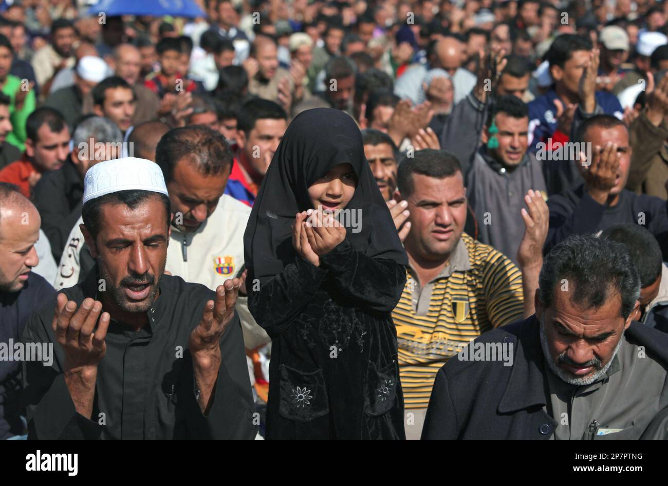 Iraqi worshippers pray during Friday prayers in the Shiite stronghold ...