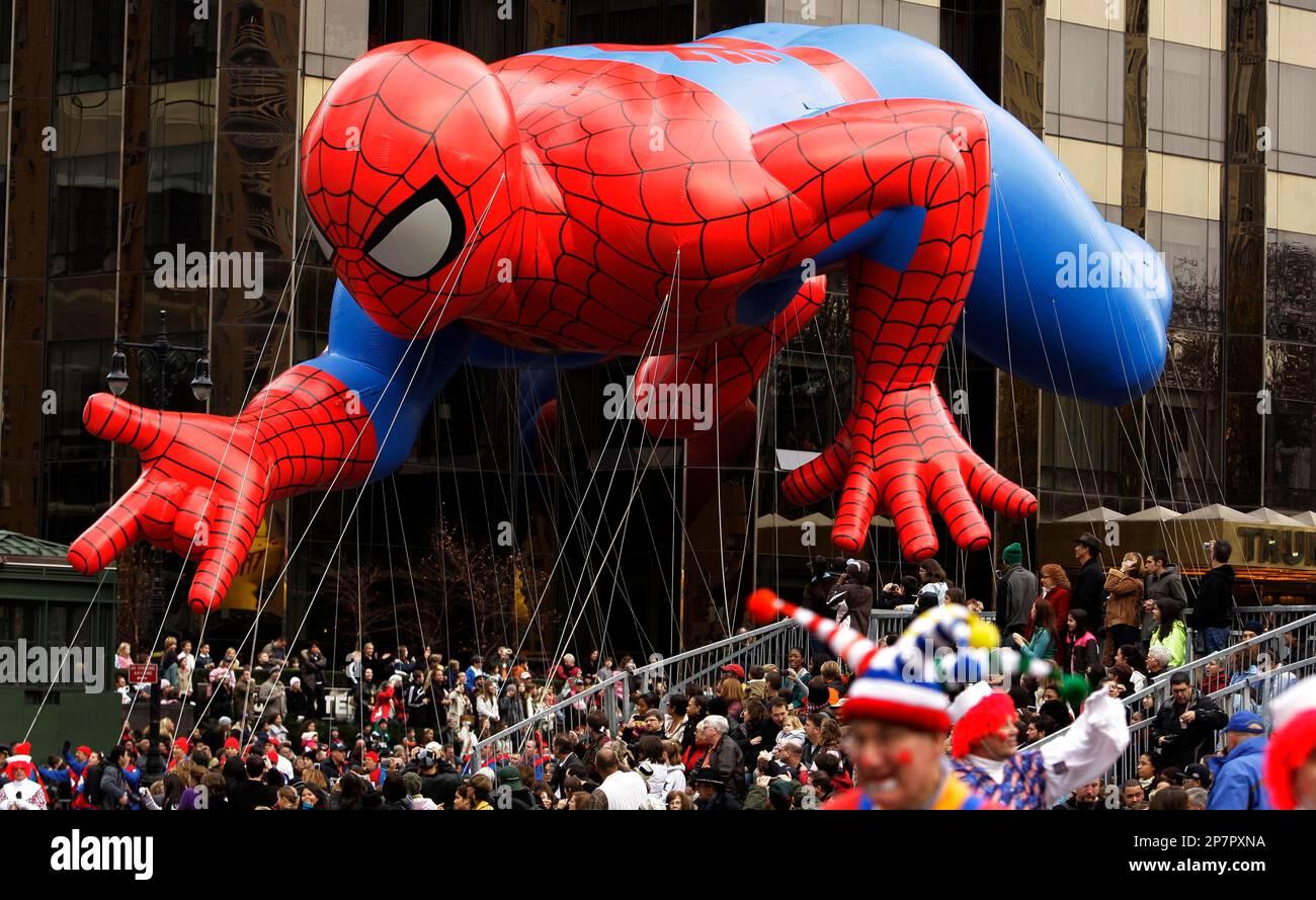 The Spiderman float is guided across Central Park South during the Macy ...
