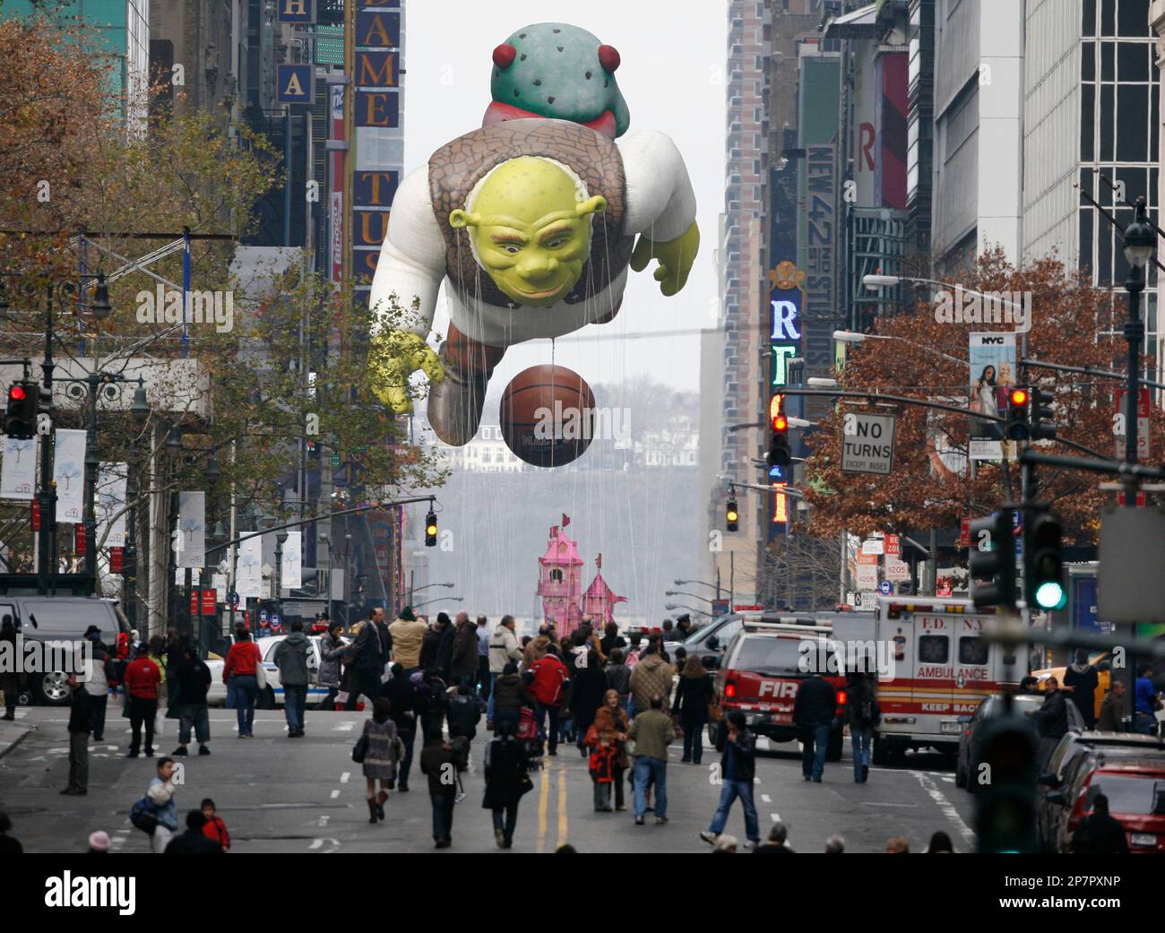 A float representing the animated character Shrek is moved east on 42nd ...