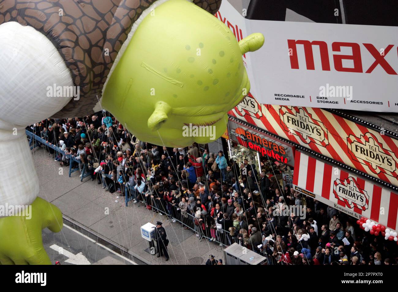 The Shrek balloon floats through Times Square during Macy's ...