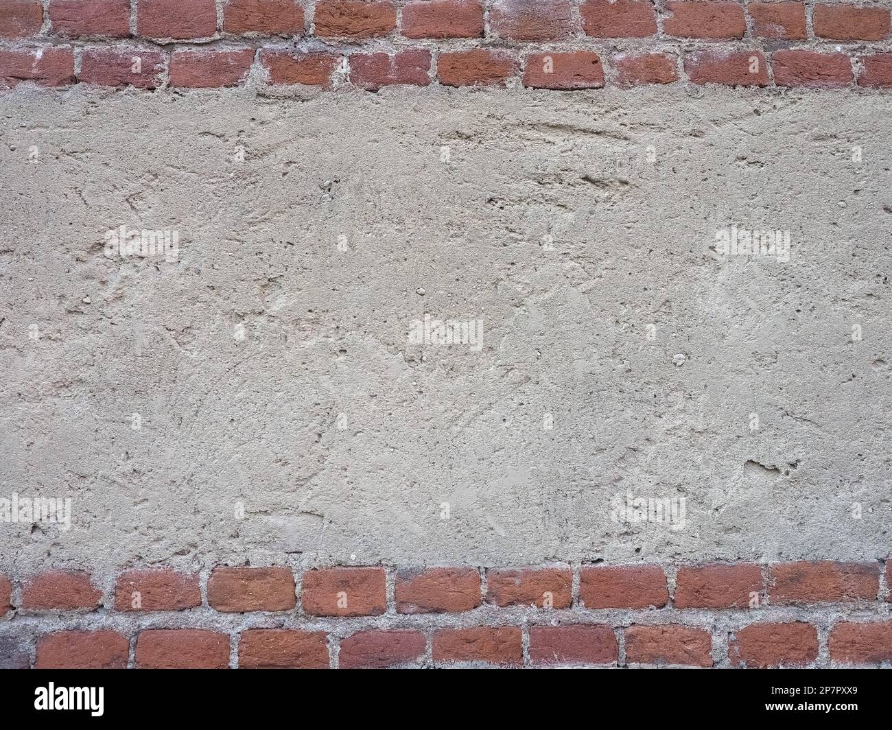 bricks and plaster wall useful as a background Stock Photo - Alamy