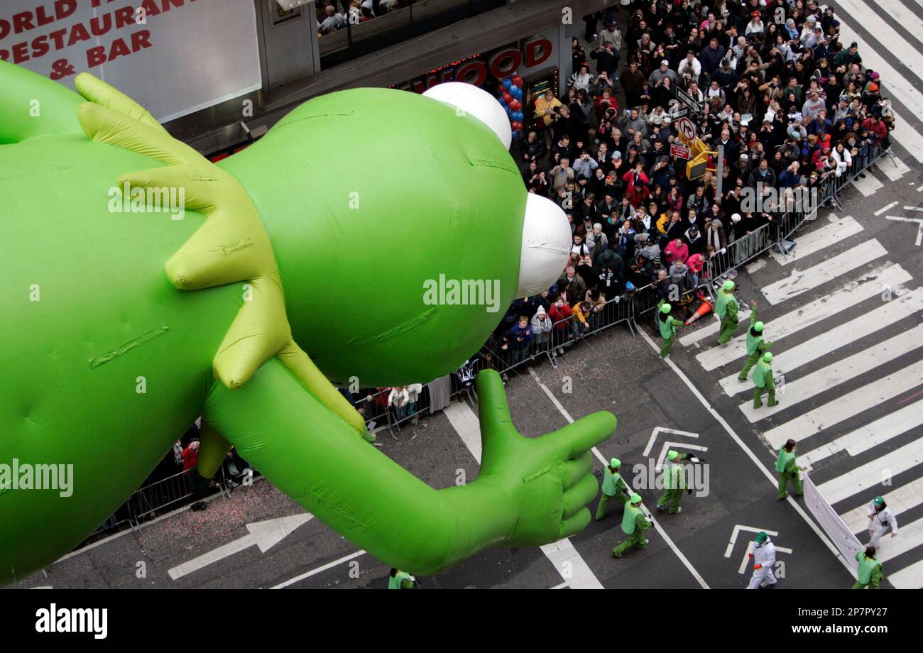 The Kermit the Frog balloon floats through Times Square during Macy's ...