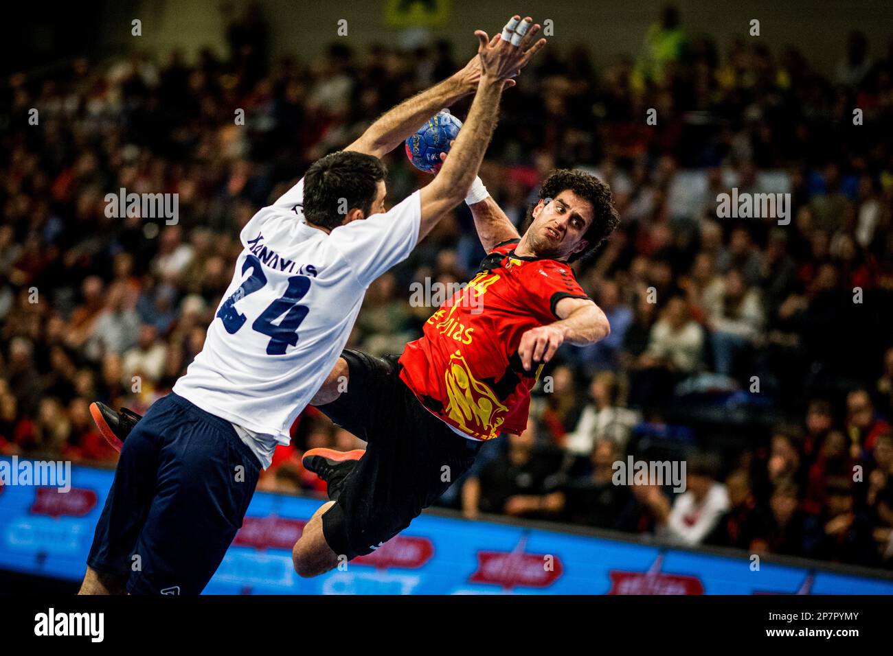 Greek Petros Kandylas and Belgium's Jeroen De Beule fight for the ball ...