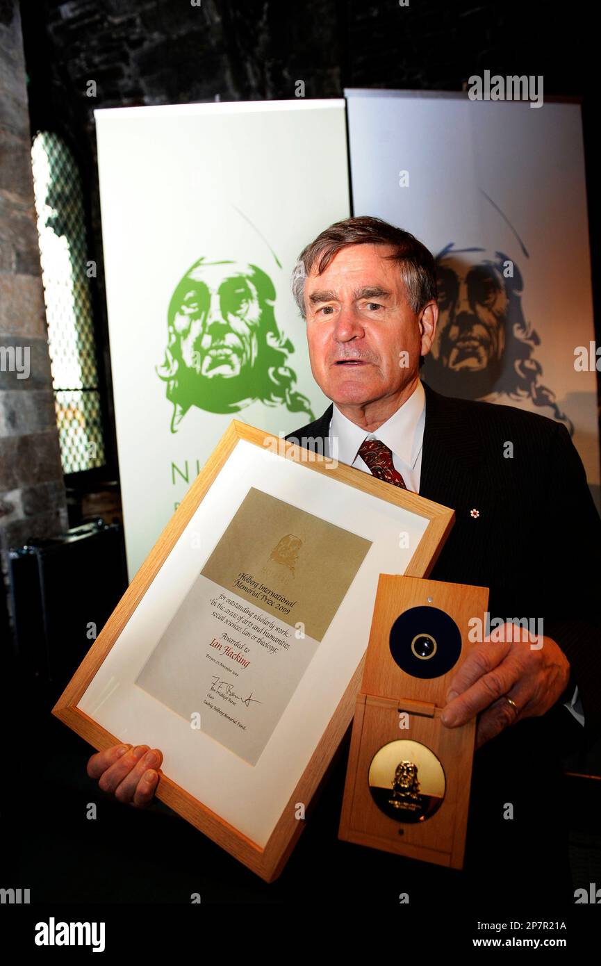 Canadian philosopher Ian Hacking, displays his certificate and trophy ...