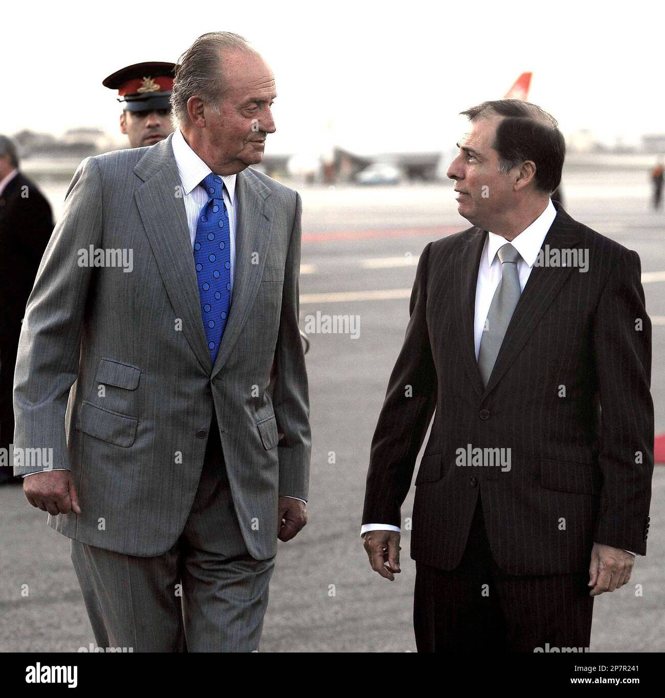 Spain's King Juan Carlos I, left, is welcomed by the President of Malta ...
