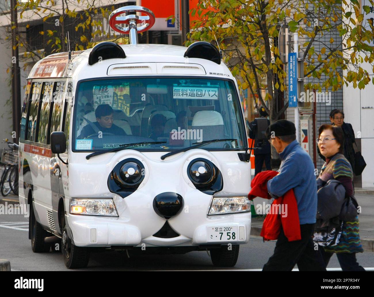 A panda bus runs in Asakusa district in Tokyo, Japan, Wednesday, Nov ...