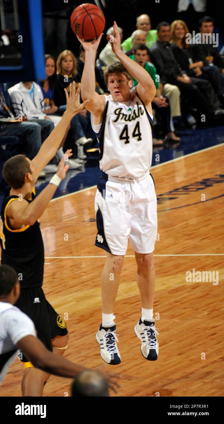 Notre Dame forward Luke Harangody, right, puts up a shot as Kennesaw ...