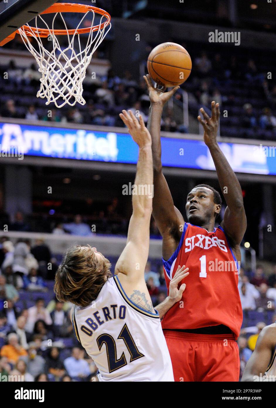 Philadelphia 76ers center Samuel Dalembert (1) goes to the basket ...