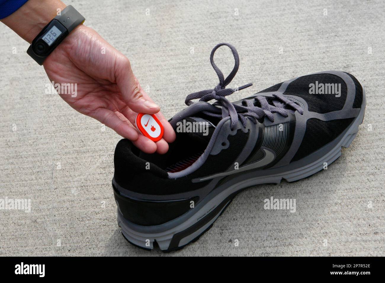 In this photo made Tuesday, Nov. 10, 2009, the Nike SportBand and ...