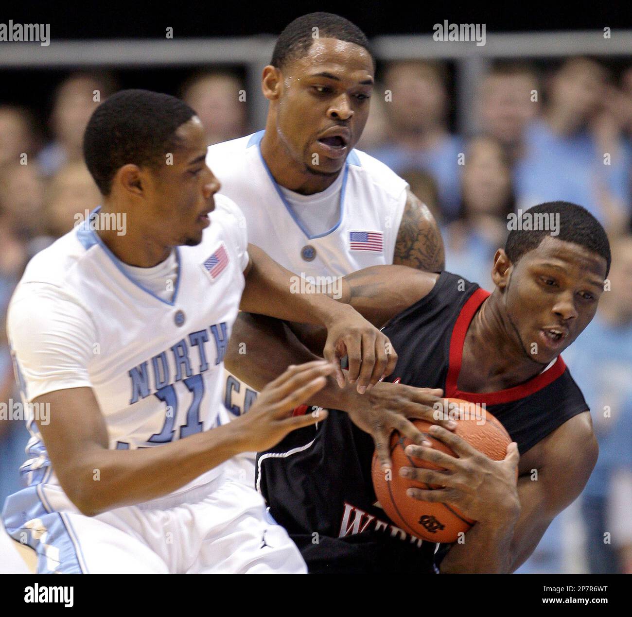 North Carolina's Larry Drew II (11) and Will Graves pressure Gardner ...