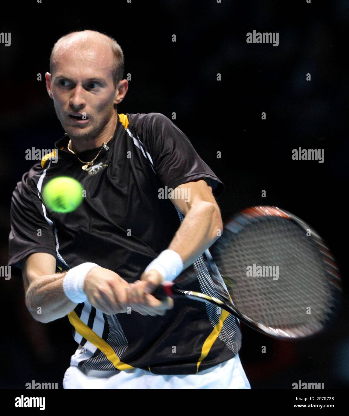 Russia's Nikolay Davydenko returns the ball to Serbia's Novak Djokovic ...