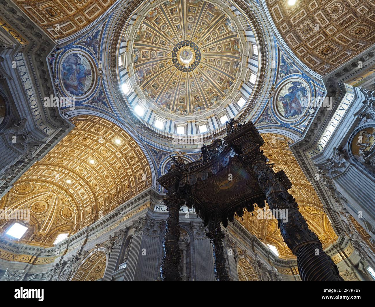 The huge bronze altar in Saint Peters Basilica in the Vatican. It is ...