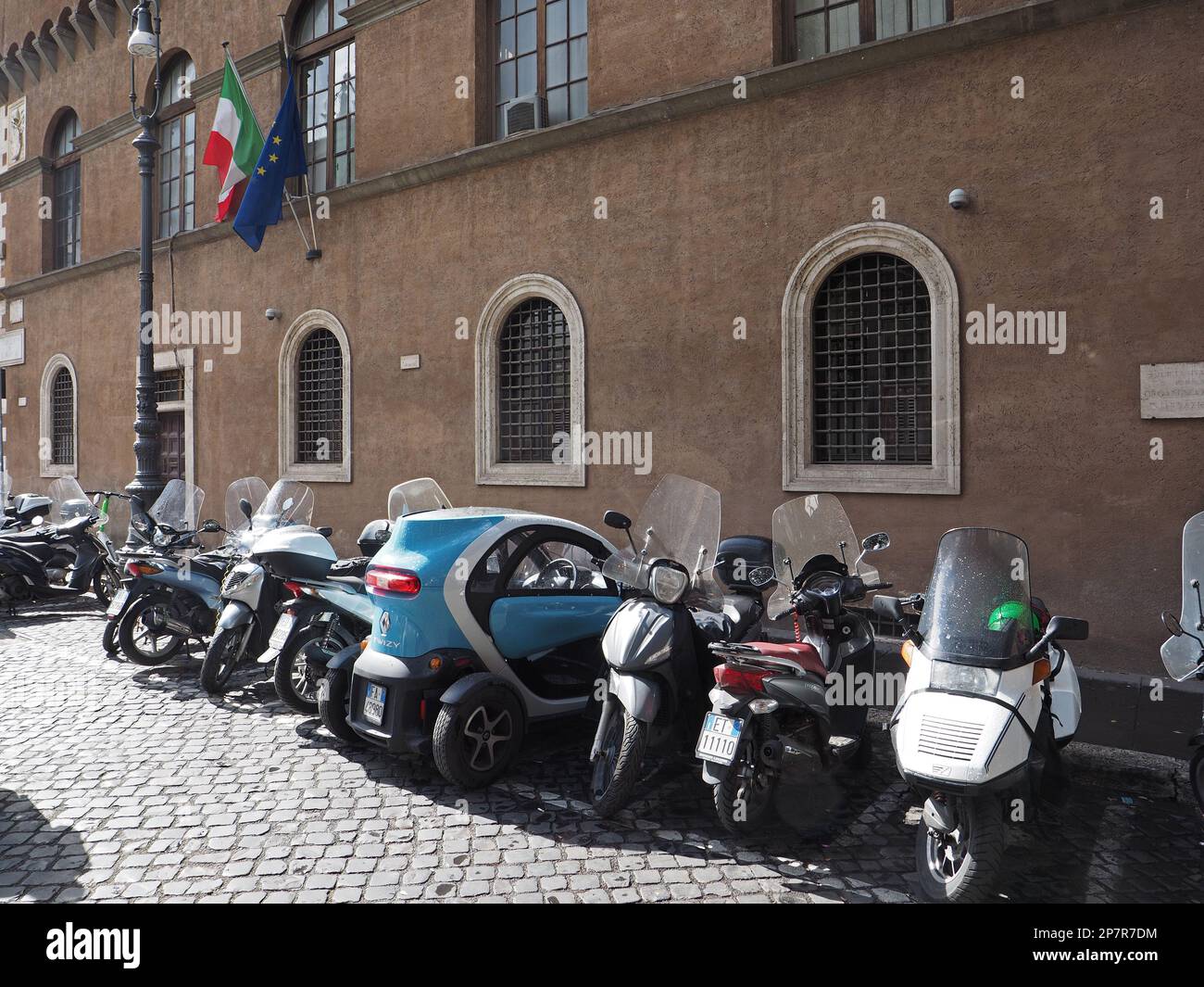Super small Renault Twizy electric car parked in a scooter spot in Rome ...