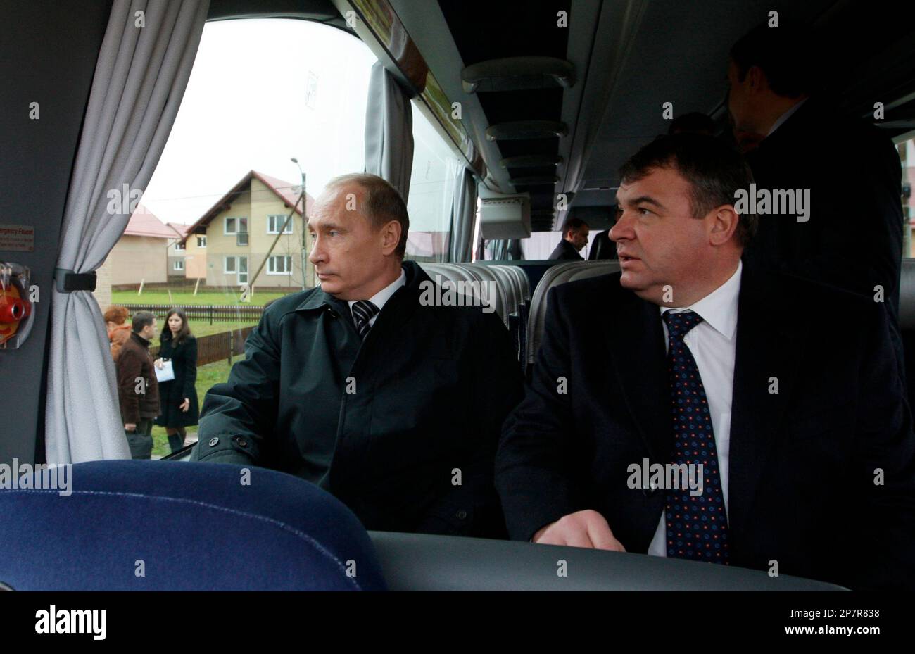 Russian Prime Minister Vladimir Putin, left and Defense Minister ...