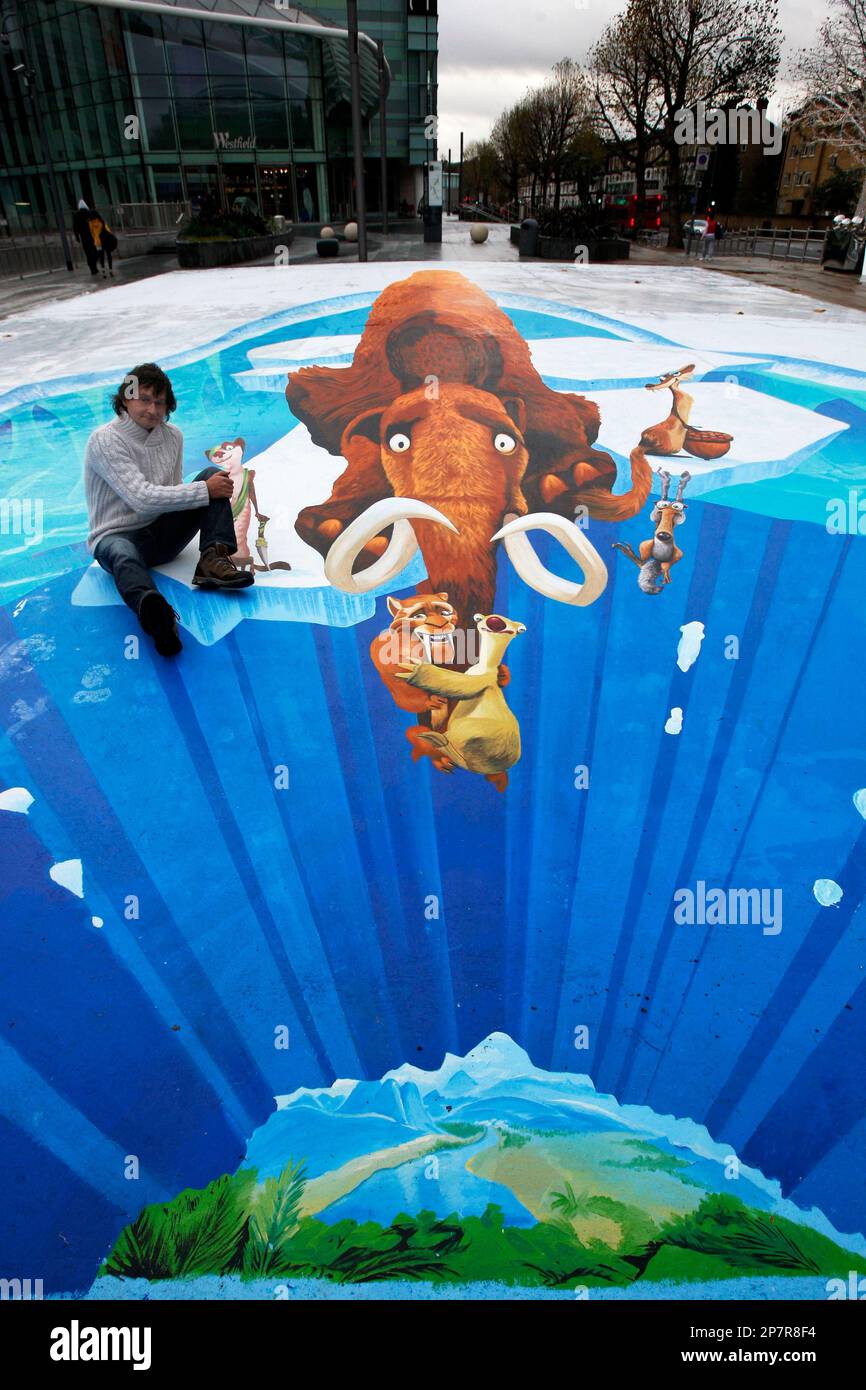 German pavement artist Edgar Mueller poses with his anamorphic pavement ...
