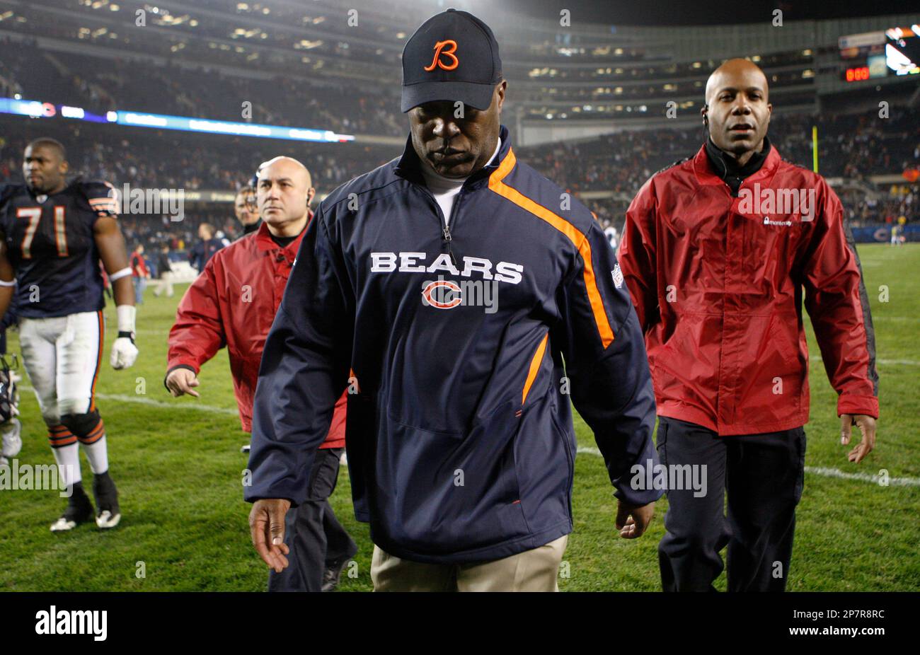 Chicago Bears head coach Lovie Smith walks off the field after the Bears' 24-20 loss to the ...