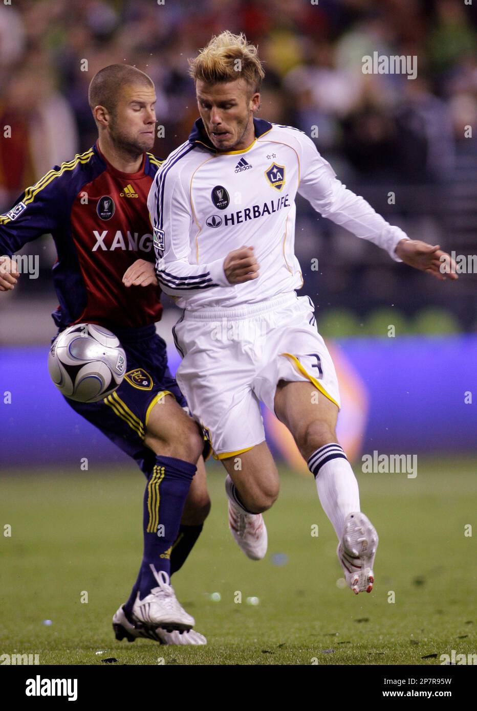 Real Salt Lake's Chris Wingert, left, battles for the ball with Los ...