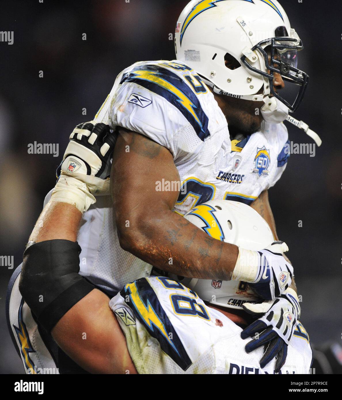 San Diego Chargers' Mike Tolbert (35) celebrates with teammate Kris ...