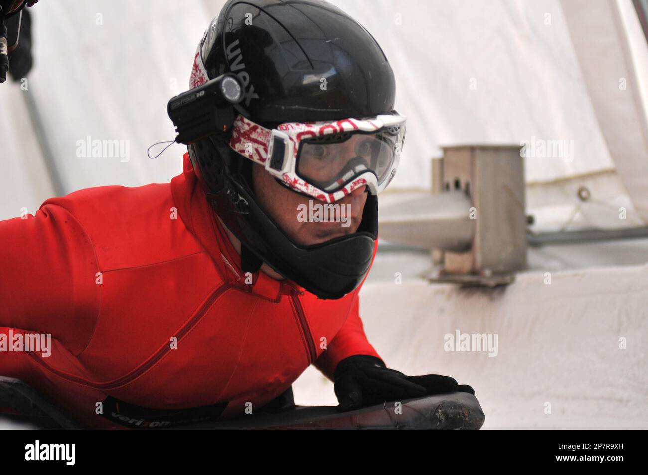Television personality Stephen Colbert peers down the track while ...