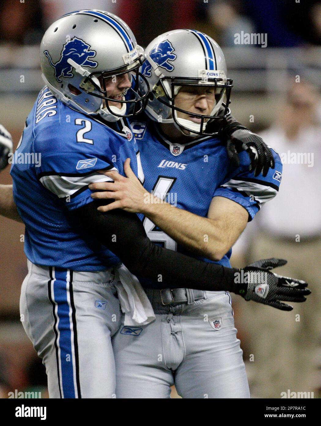 Detroit Lions kicker Jason Hanson, right, celebrates his game-winning ...