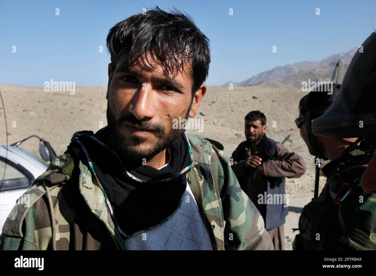 In this picture taken Thursday Nov. 19, 2009, Rahimullah stands at an Afghan National Army ...