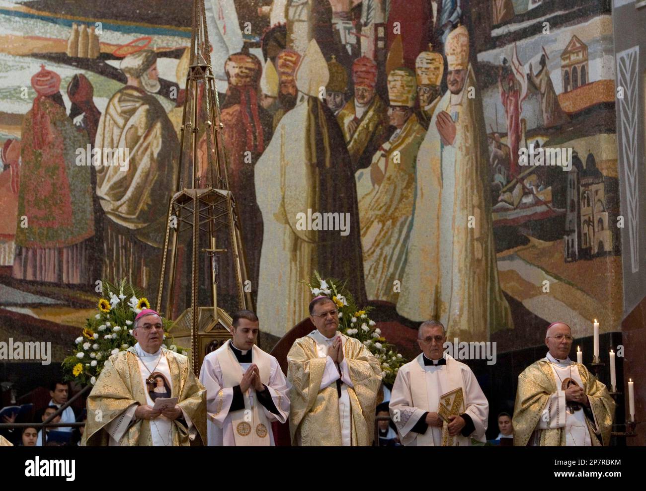 Latin Patriarch of Jerusalem Fouad Twal, center, and other Christian ...