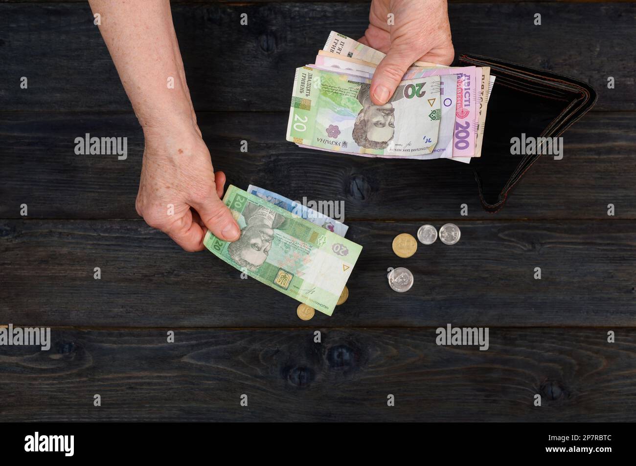 An elderly retired woman counts her money Stock Photo - Alamy