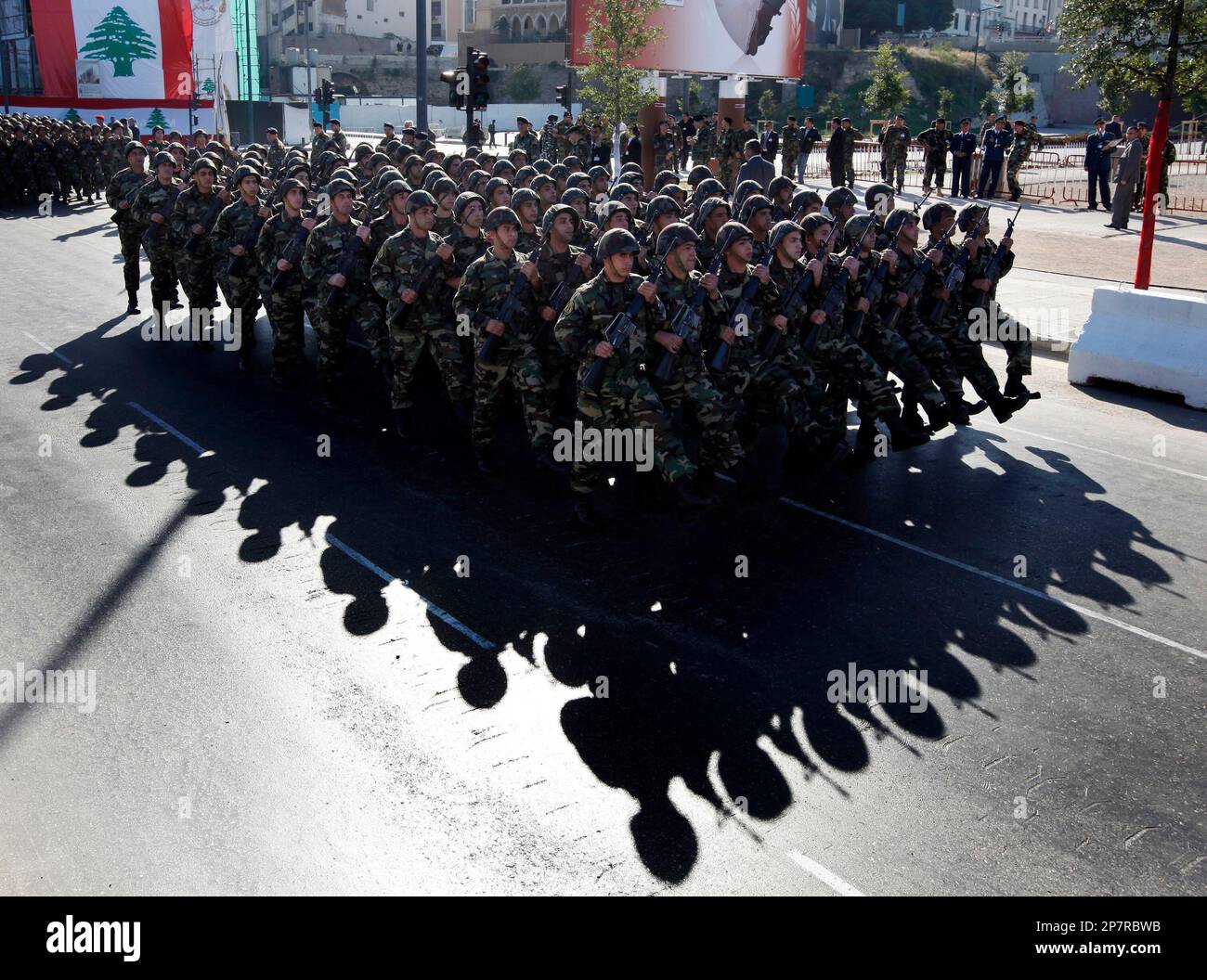 Lebanese army soldiers march during a military parade to mark the 66th ...
