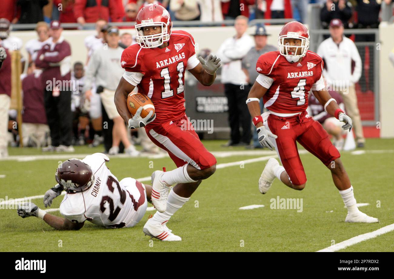 Arkansas wide receiver Cobi Hamilton (11) turns a short pass reception ...