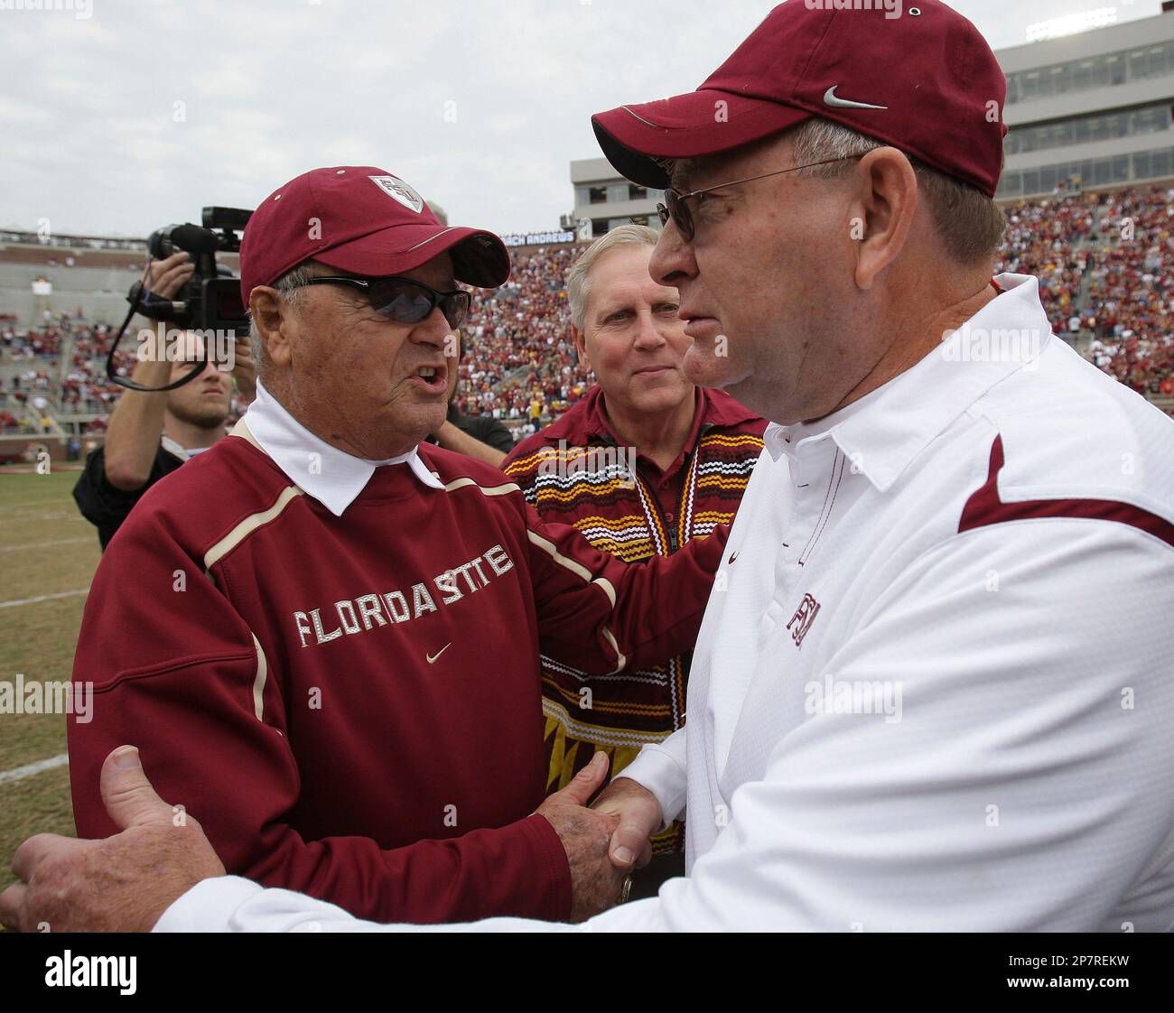 Florida State defensive coordinator Mickey Andrews, right, shakes hands ...