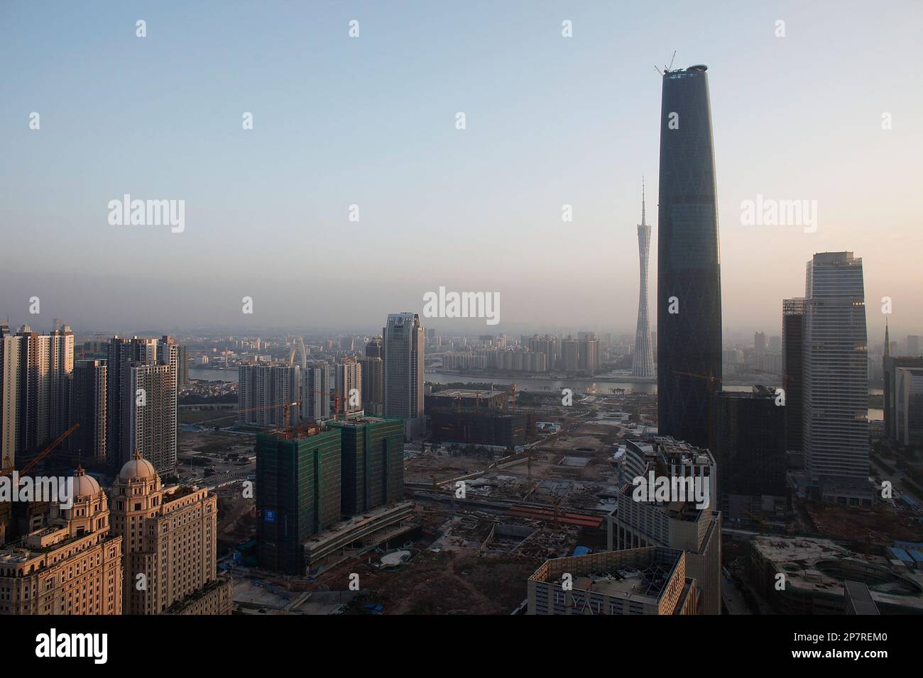 The new Guangzhou TV Tower and the West Tower are seen from the Pearl ...