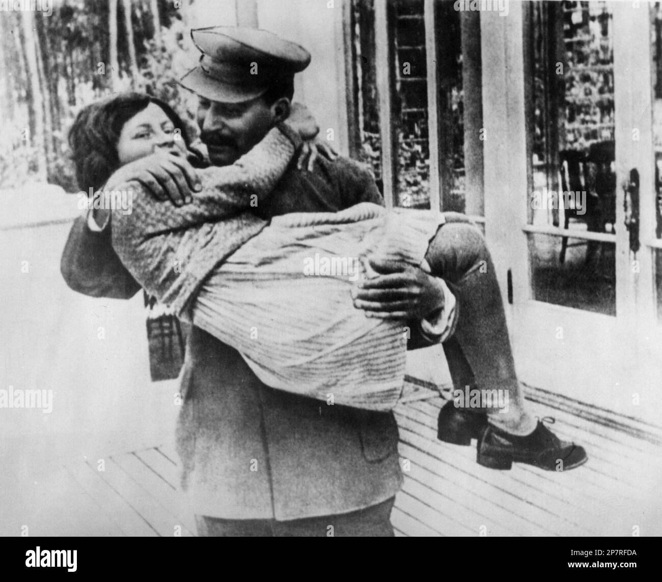FILE - This 1936 file photo shows Joseph Stalin holding his daughter ...