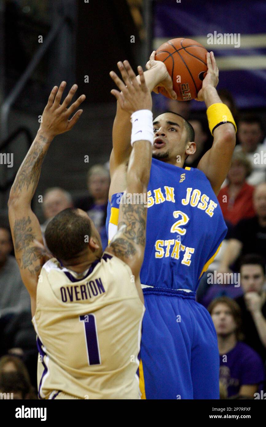 San Jose State guard Adrian Oliver (2) shoots over Washington guard ...