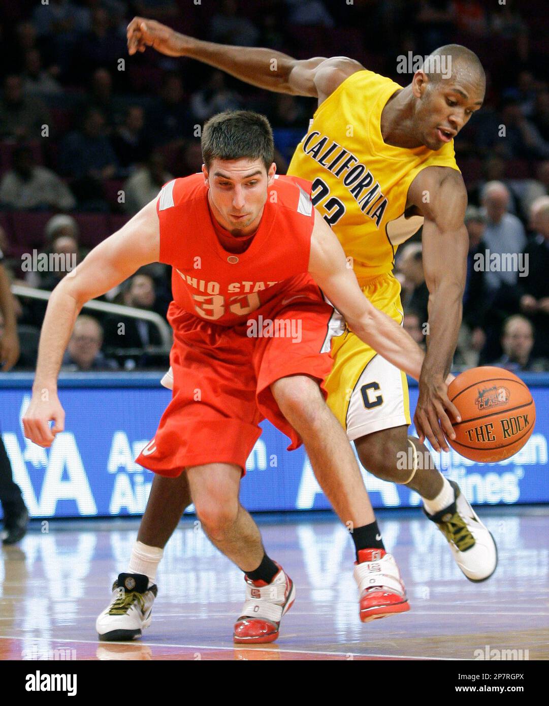 Ohio State's Jon Diebler, left, is fouled by California's Patrick ...