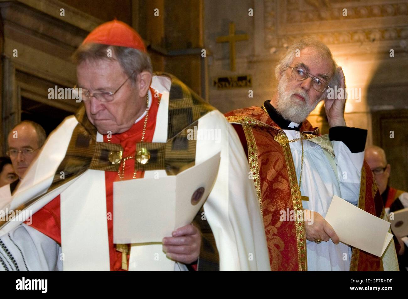 Archbishop of Canterbury Rowan Williams, right, and Vatican official in ...