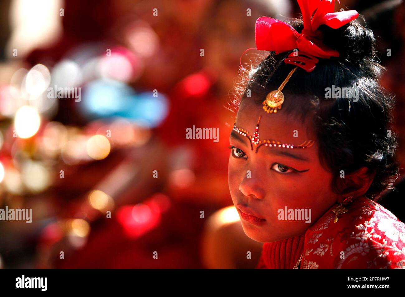 A Nepalese girl participates in the Ehee festival in Katmandu, Nepal ...