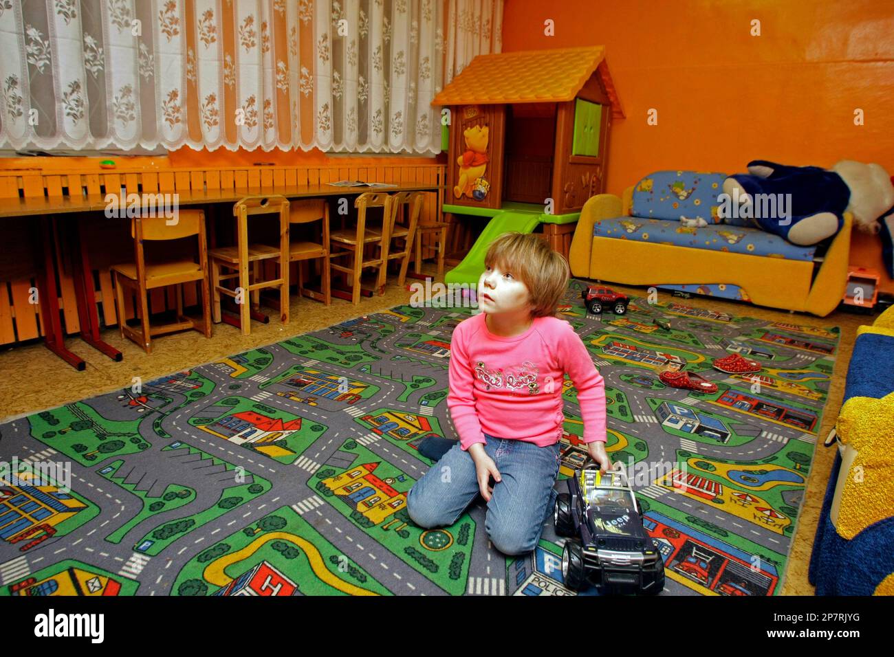 This Nov. 13, 2009 photo shows Tanya playing with her toy jeep on the ...
