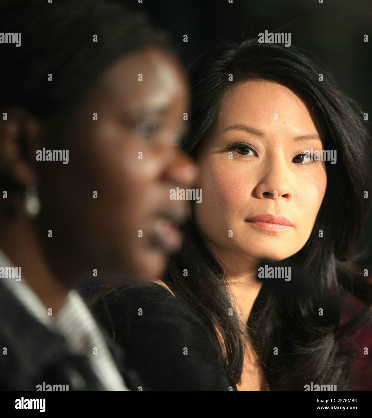 Actress Lucy Liu, left, an ambassador for UNICEF, the U.N. children's ...