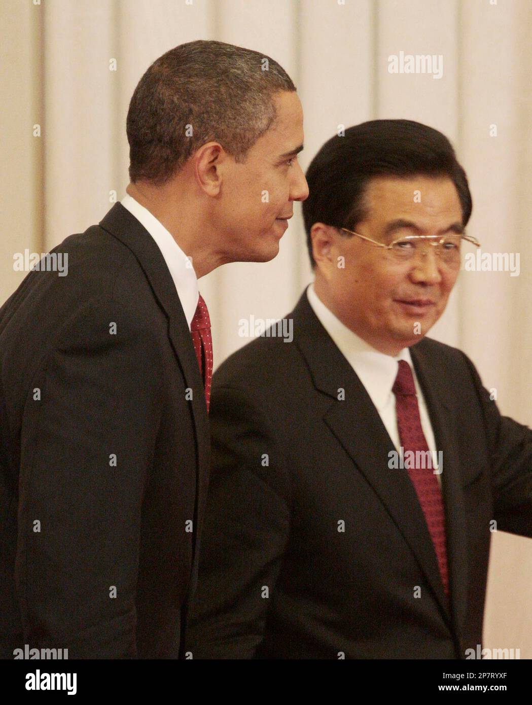 U.S. President Barack Obama, left, walks out with Chinese President Hu ...