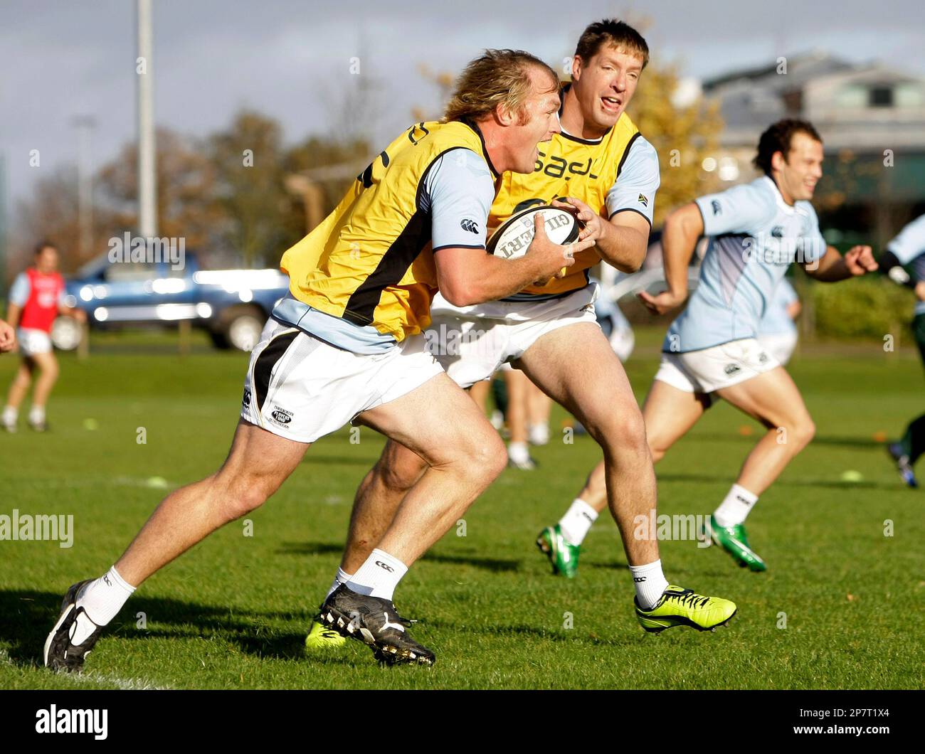 South Africa's Schalk Burger, left, runs with the ball during a team ...