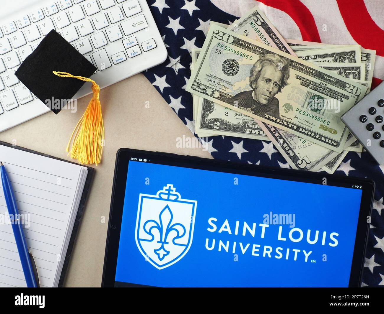 In this photo illustration, Saint Louis University logo seen displayed ...