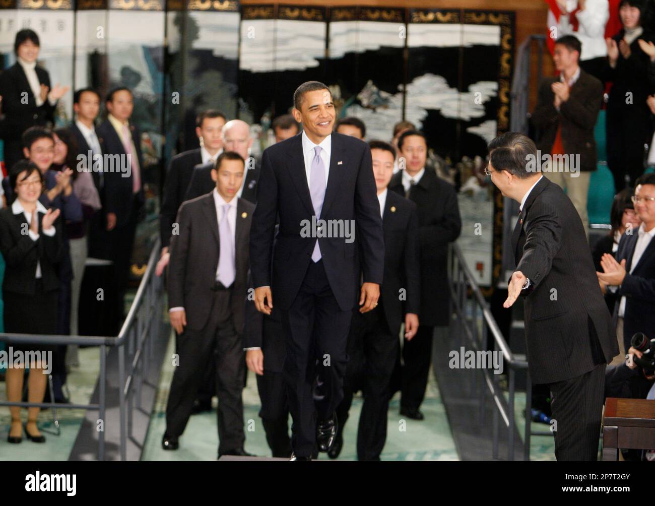 U.S. President Barack Obama arrives to speak at a town hall style event ...
